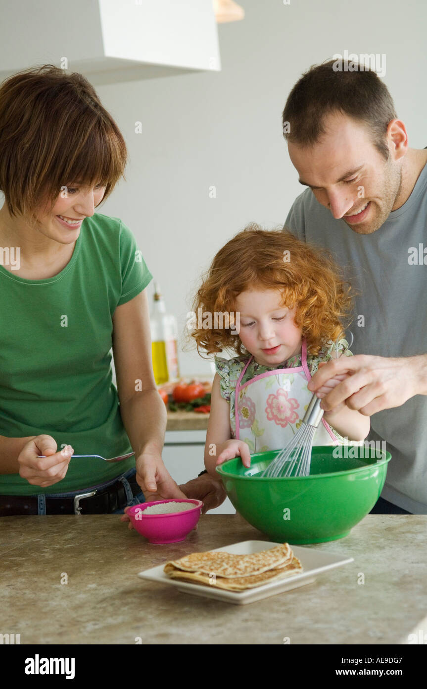 family in the kitchen Stock Photo - Alamy