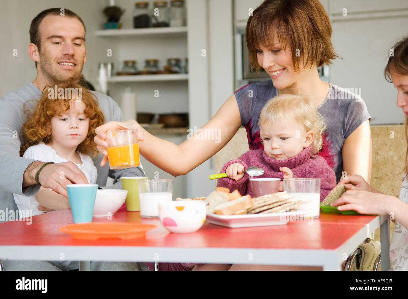 family in the kitchen Stock Photo - Alamy