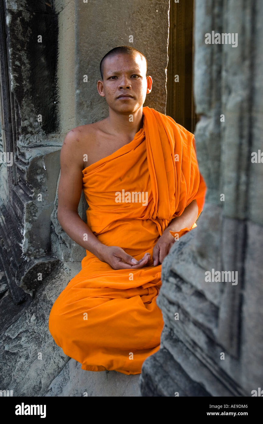 Stock photo of a novice monk at the ancient temple of Angkor Wat in ...