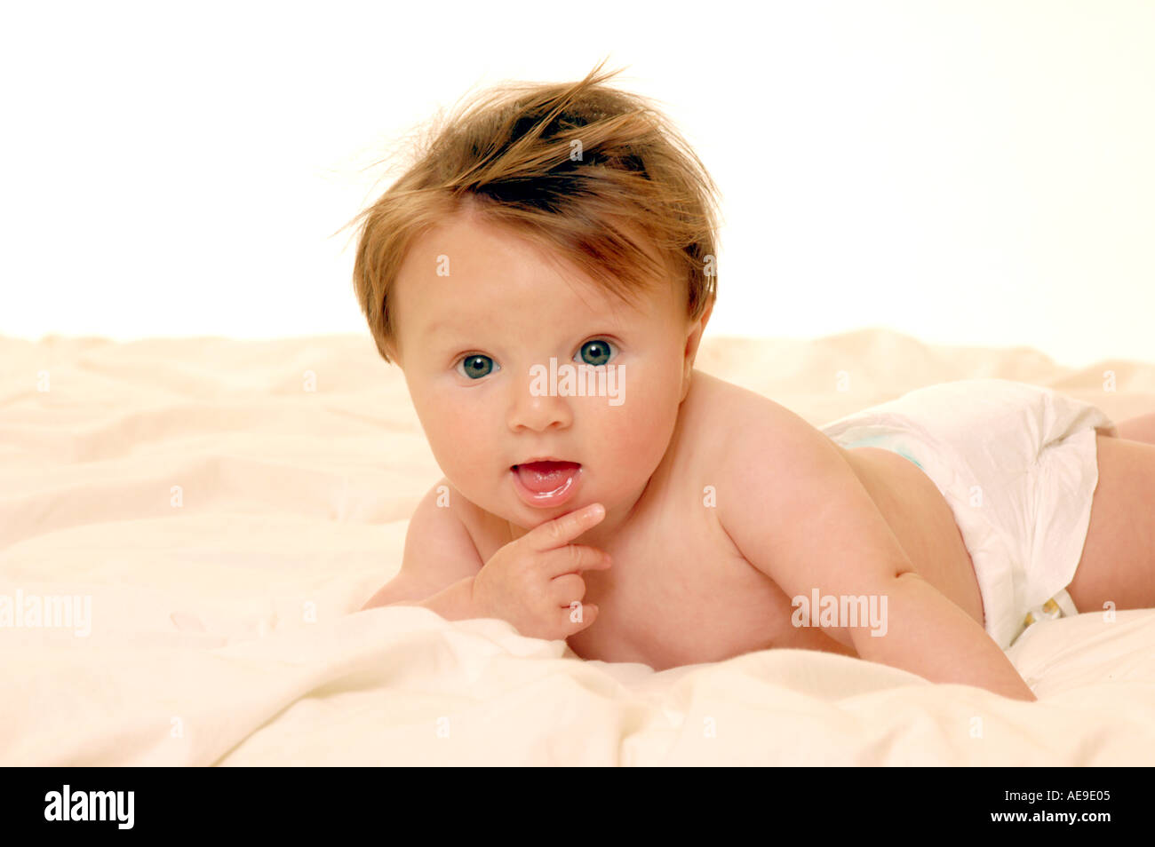 Baby boy thinking Stock Photo - Alamy