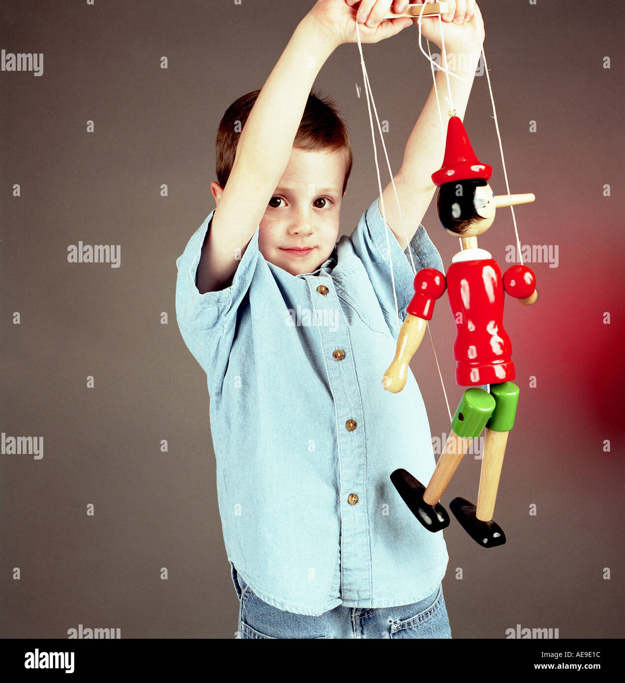 boy with Pinocchio puppet Stock Photo - Alamy