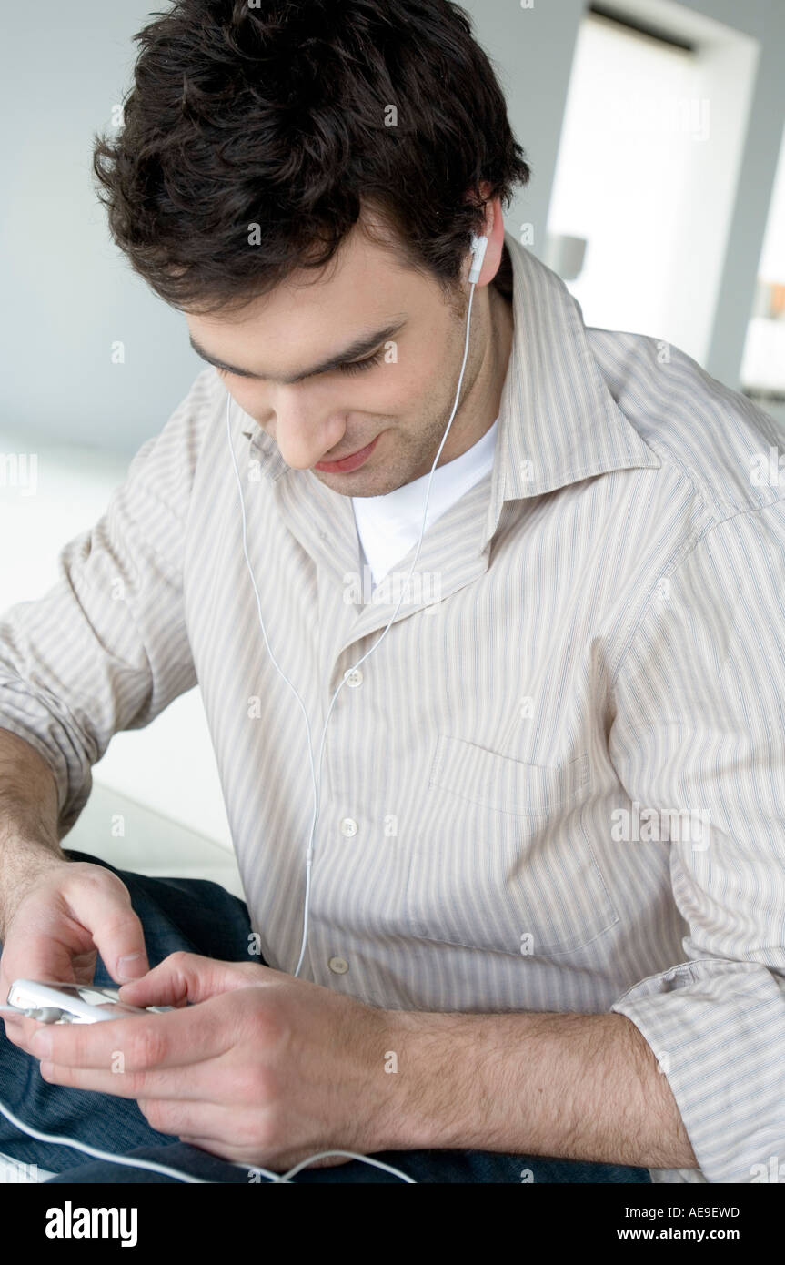 Ipod with earphone hi-res stock photography and images - Alamy
