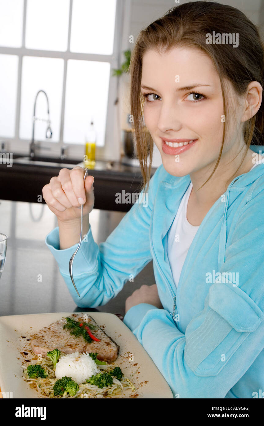 Woman eat rice hi-res stock photography and images - Alamy