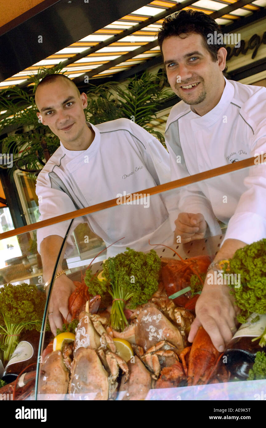 Seafood display in cold cabinet Stock Photo - Alamy