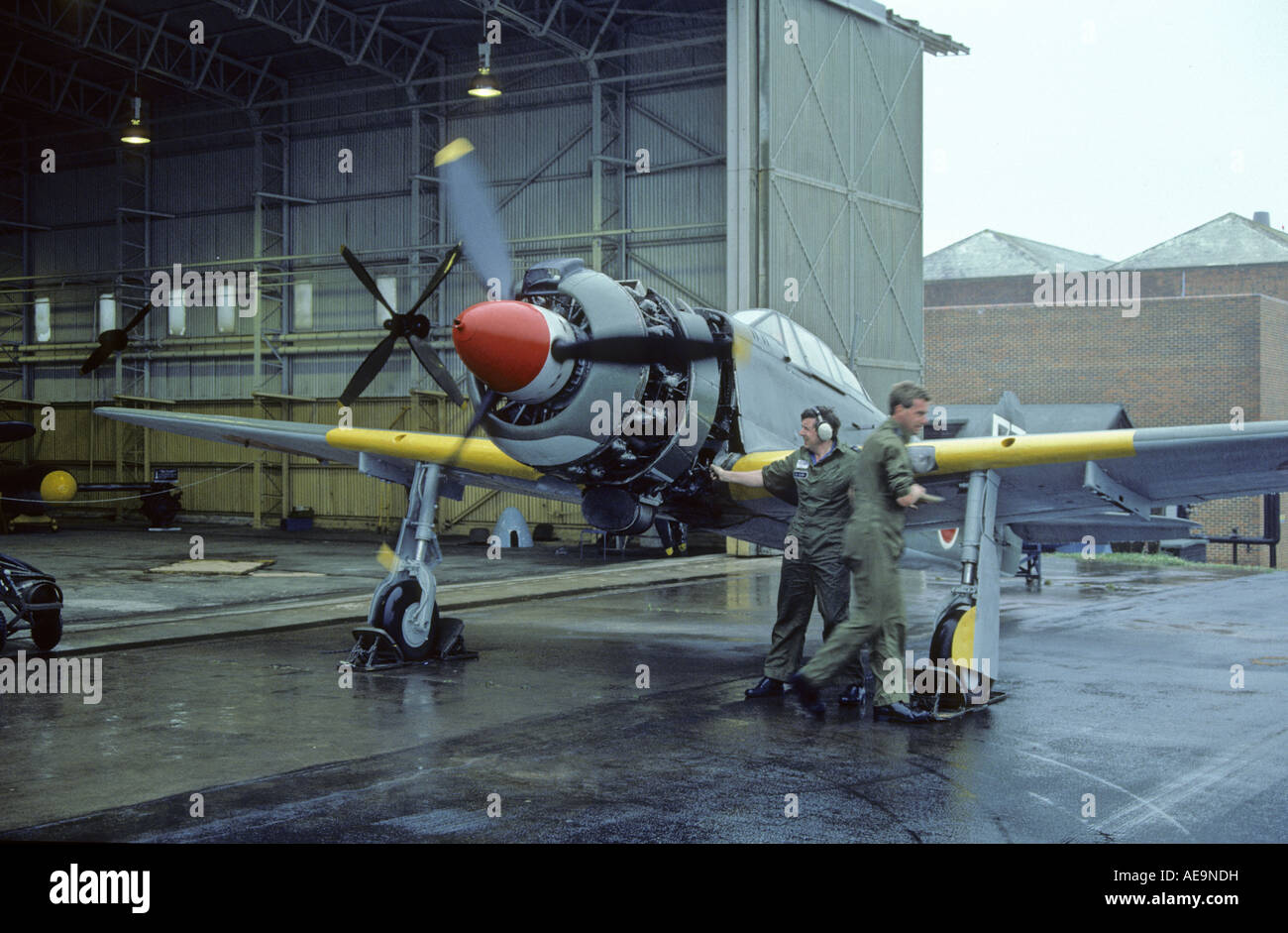 Mechanics are to start engine of Kawasaki Ki-100 Type 5 Imperial ...