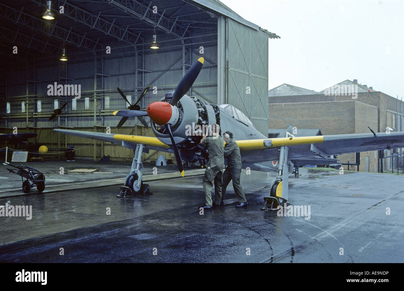 Mechanics are to start engine of Kawasaki Ki-100 Type 5 Imperial ...