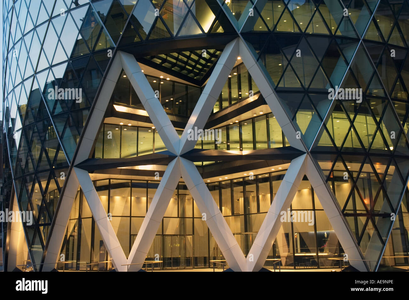 Close up of The Gherkin (Swiss Re Headquarters) at night City of London ...