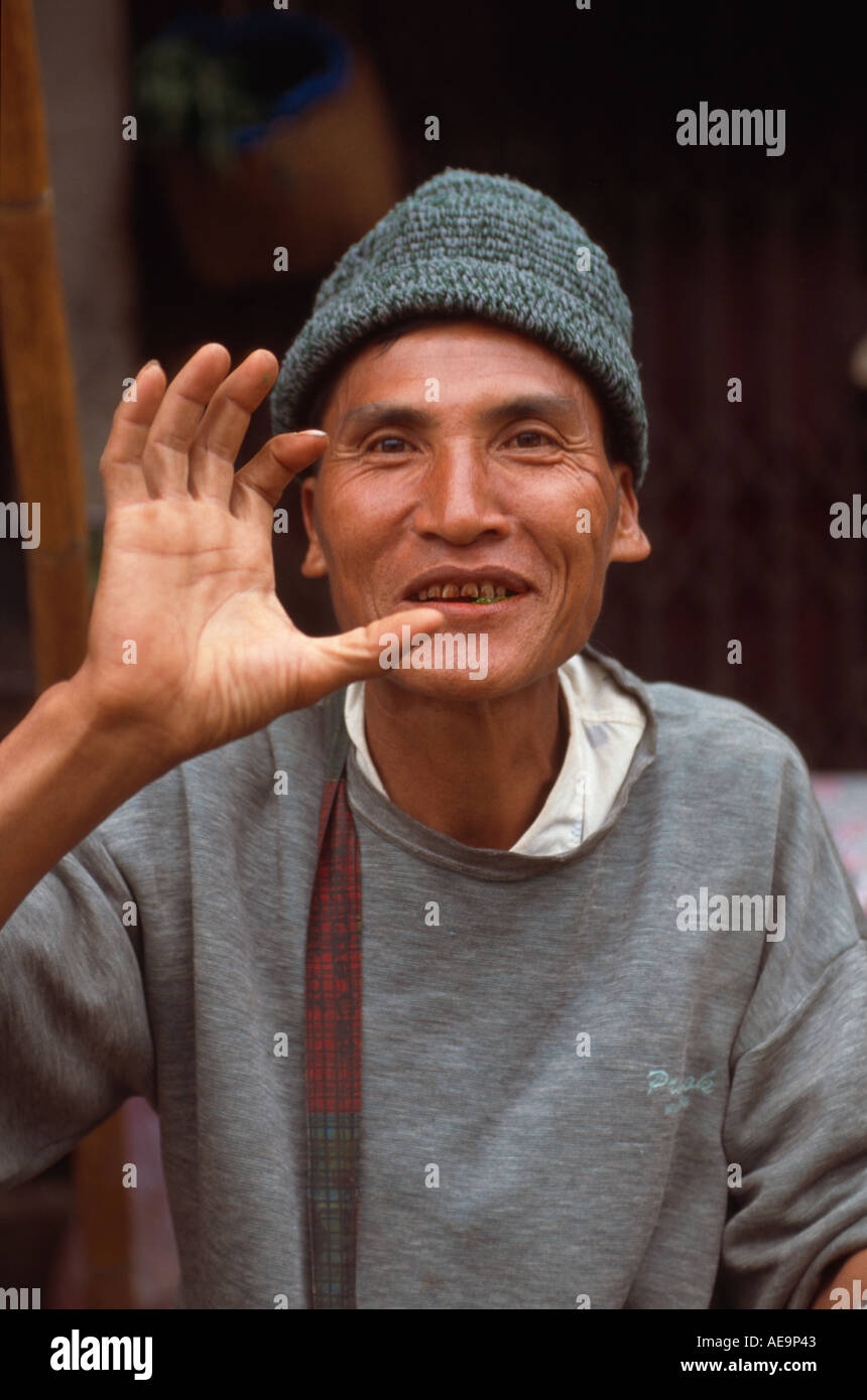 Local man playing up for the camera at a local market in Tachileik ...