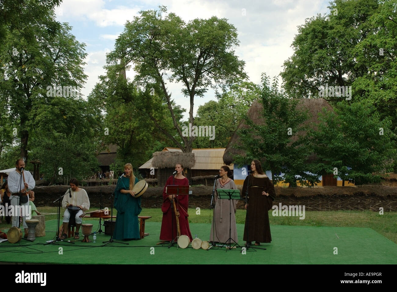 Romanian folklore group of entertainers at the Village Museum ...