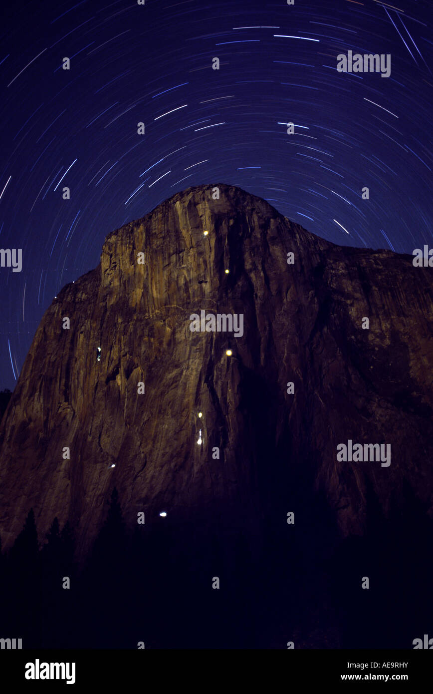 Rock Climbers on El Capitan at night with star trails and moonlight ...