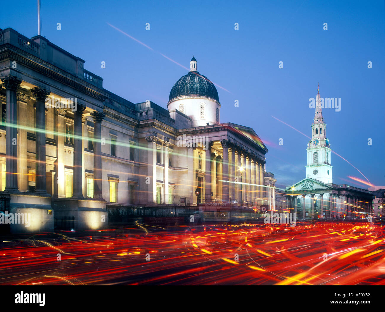 trafalgar square car trail streaks night red white streaks lights ...