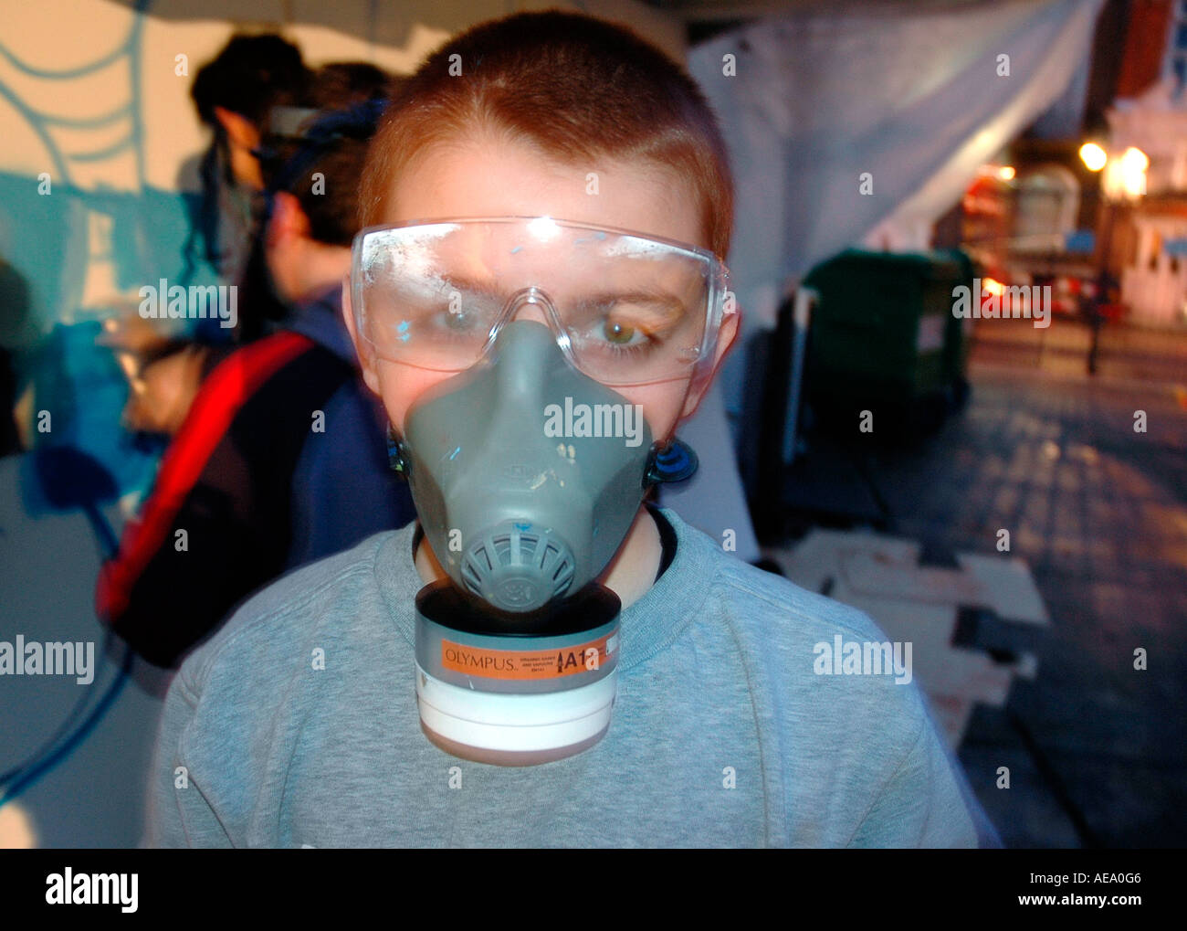 Graffiti artist with mask London UK Stock Photo - Alamy