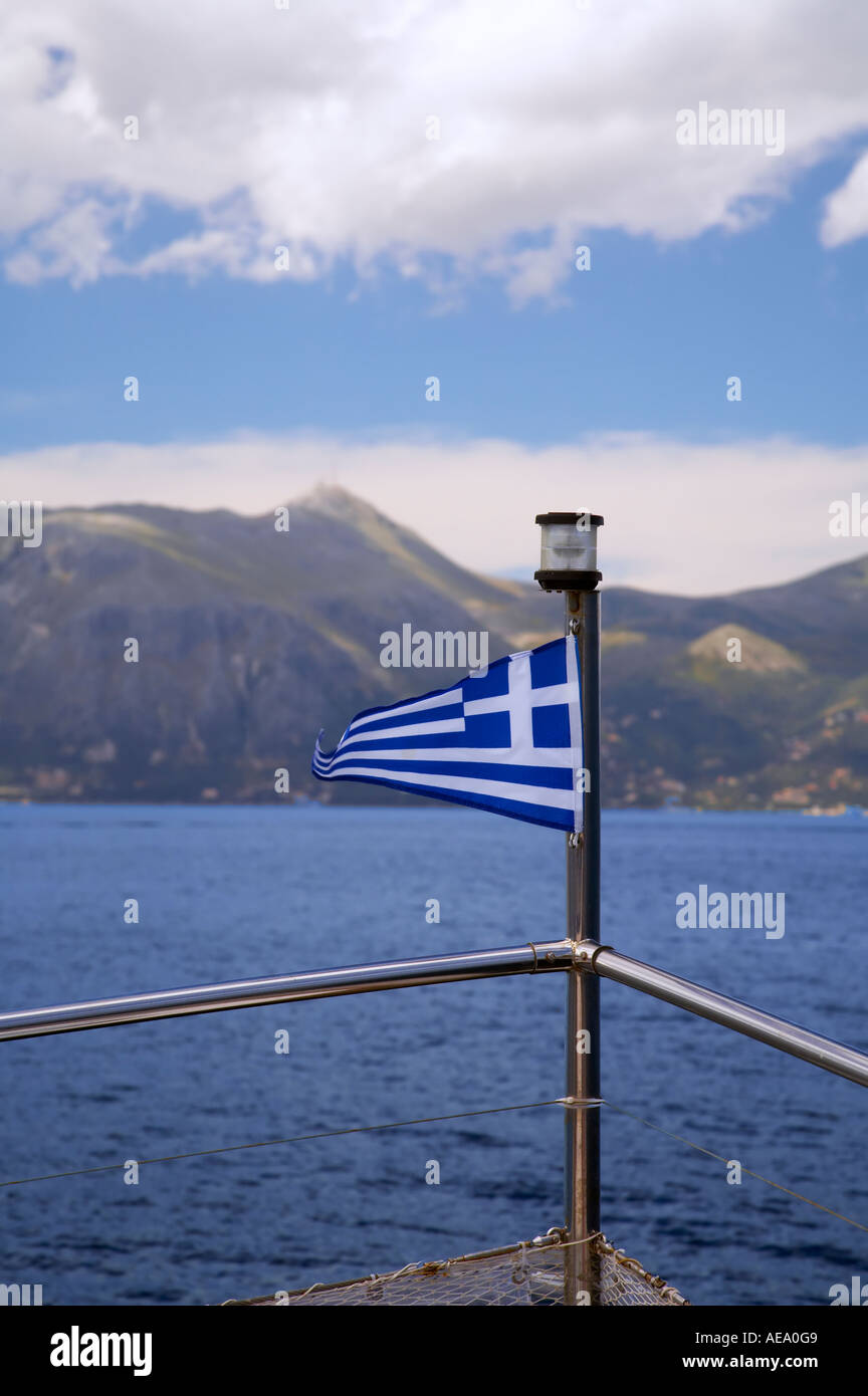 Greek flag in the bow of a small boat Stock Photo - Alamy