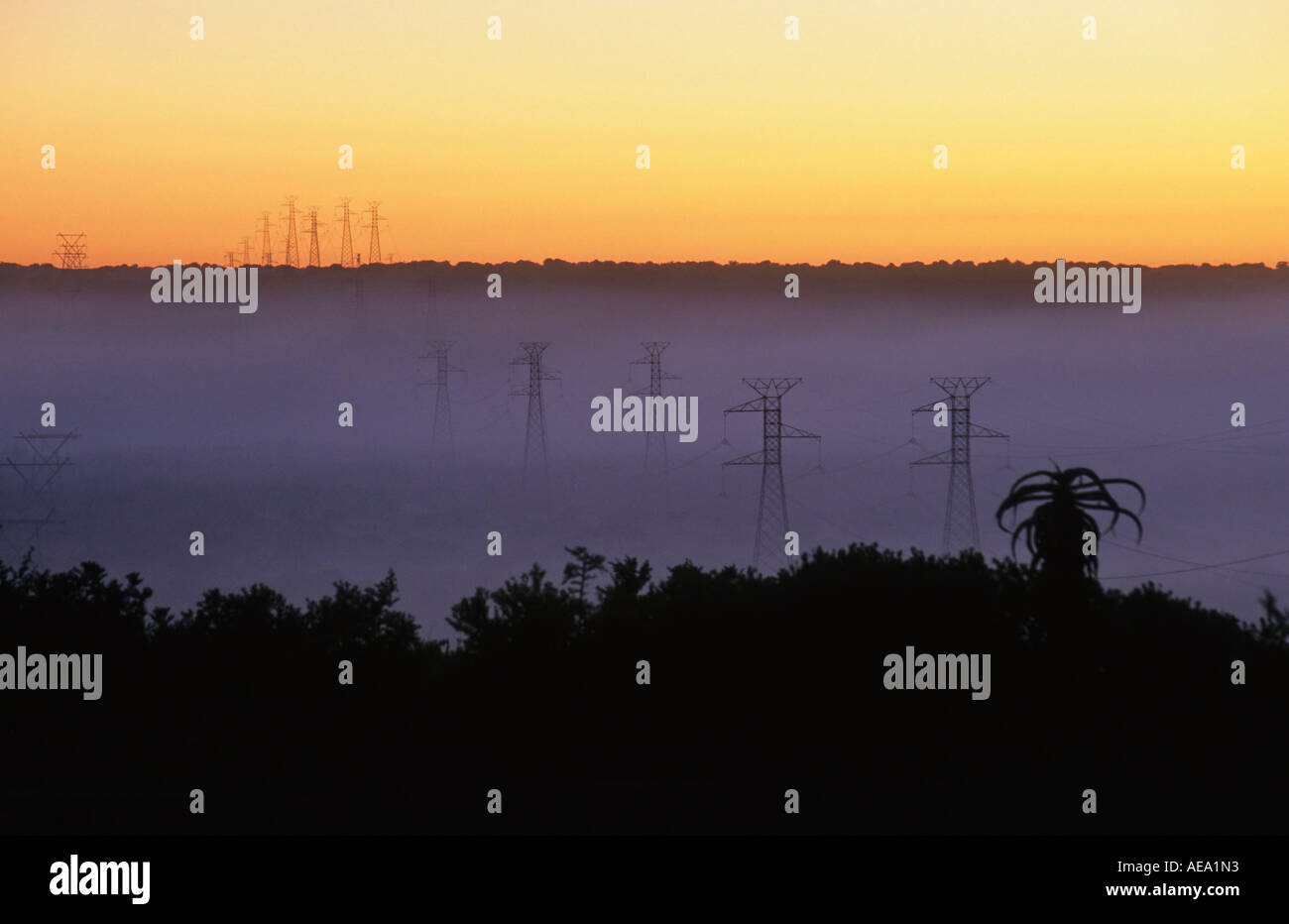 Power lines across the landscape Stock Photo - Alamy