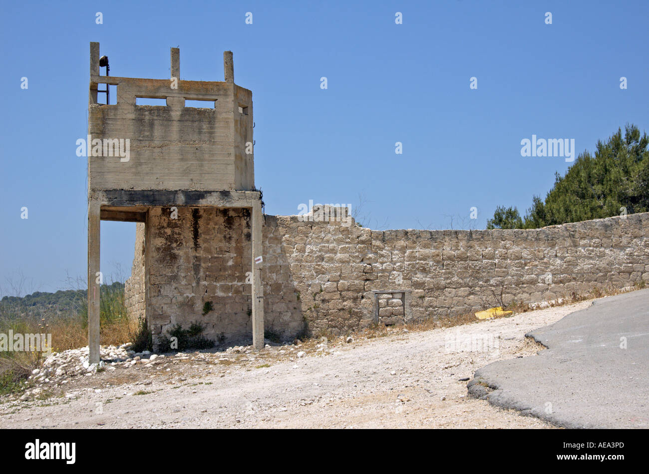 The old wall and guard tower surrounding the original settlement Bat ...