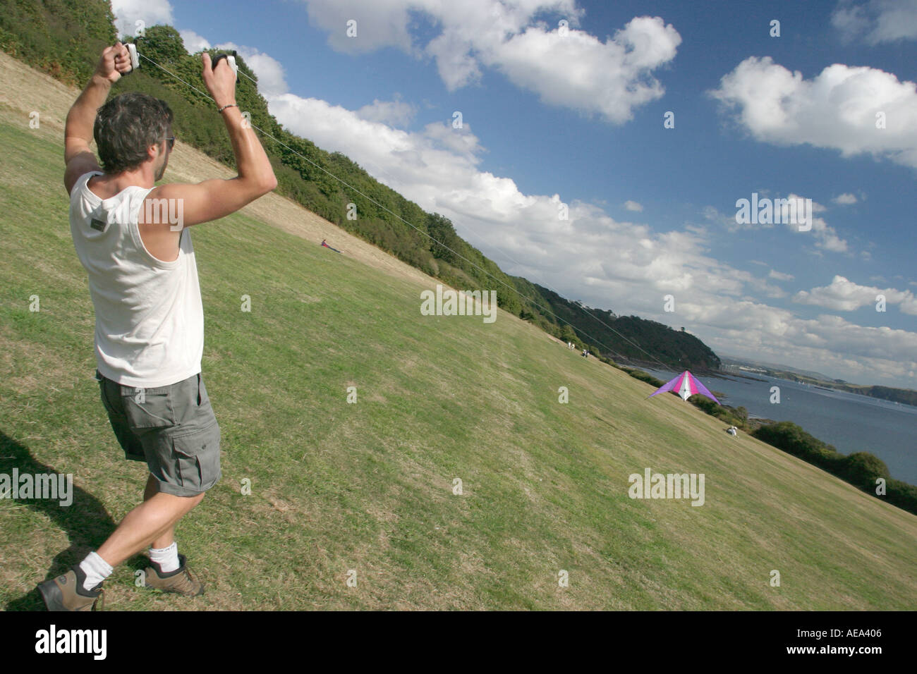 Man lifting kite hi-res stock photography and images - Alamy
