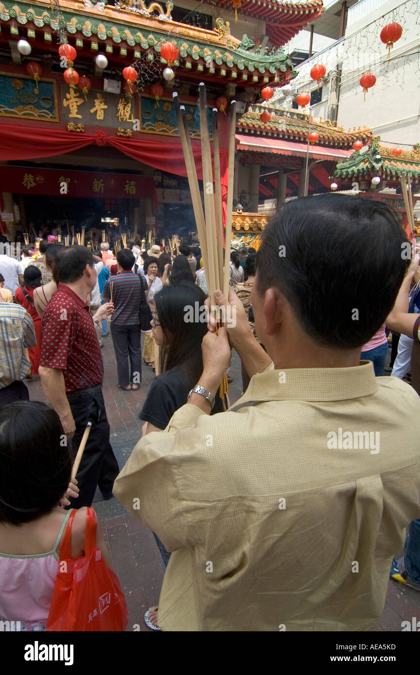 Chinese man praying at goddess mercy hi-res stock photography and ...
