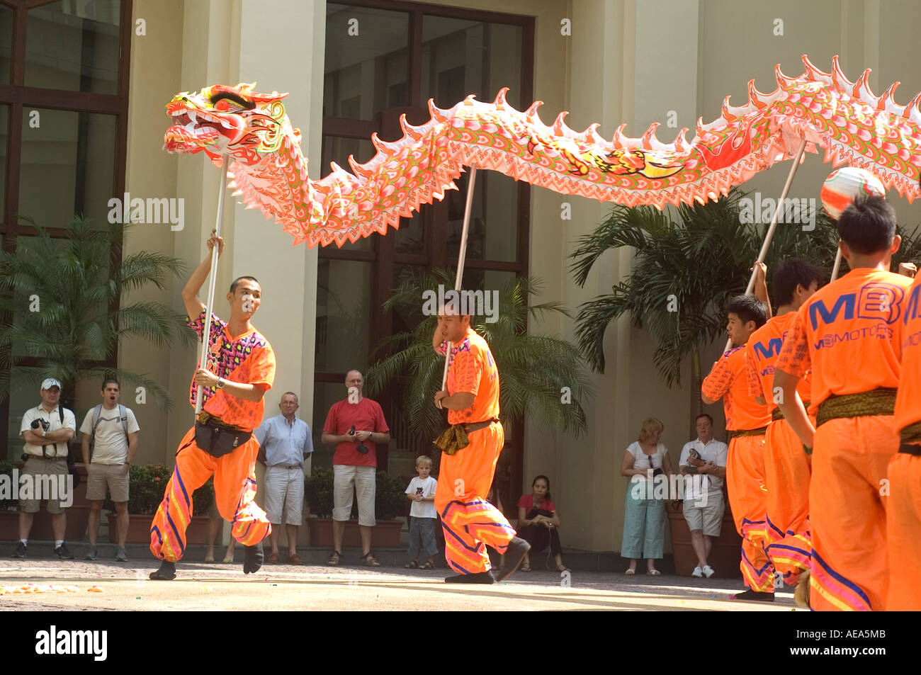 Professional dancers running and doing a Dragon Dance for the Chinese ...