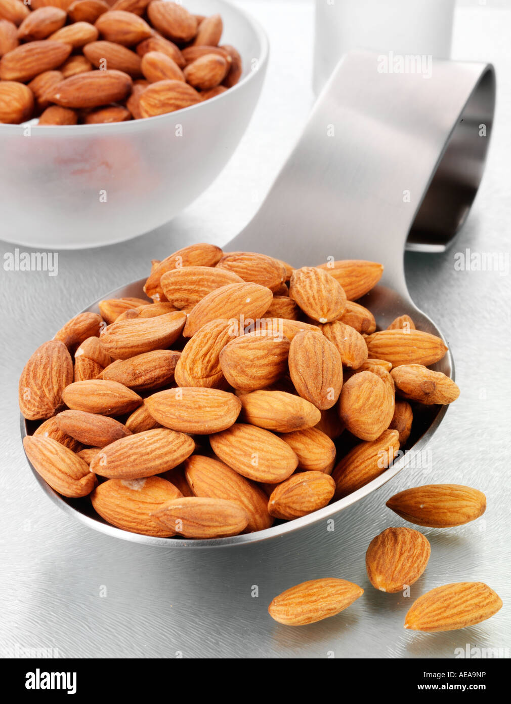 SPOONFUL OF ALMONDS Stock Photo - Alamy