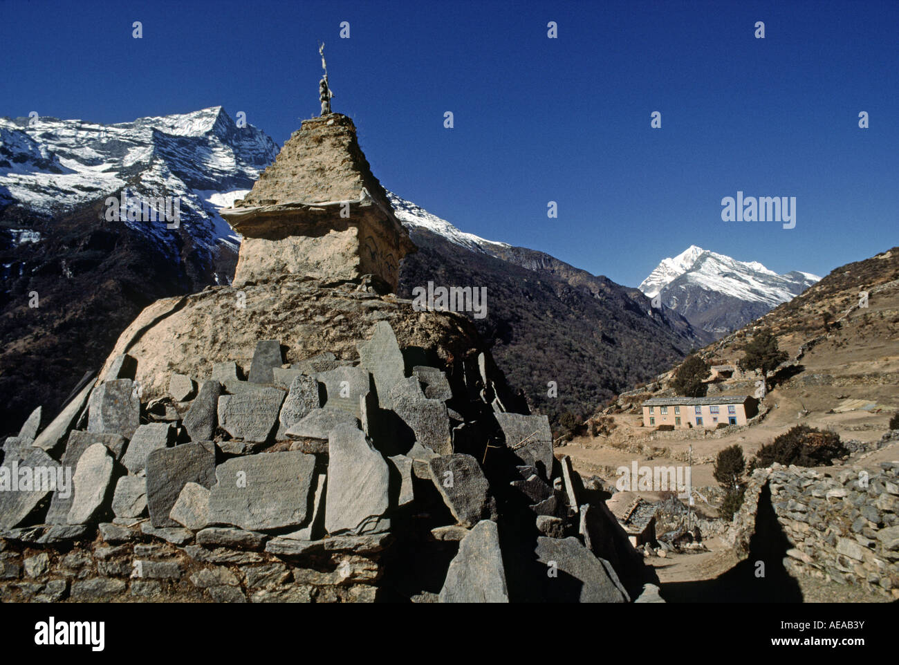 A TIBETAN BUDDHIST CHORTEN with MANI STONES on route to MOUNT EVEREST ...