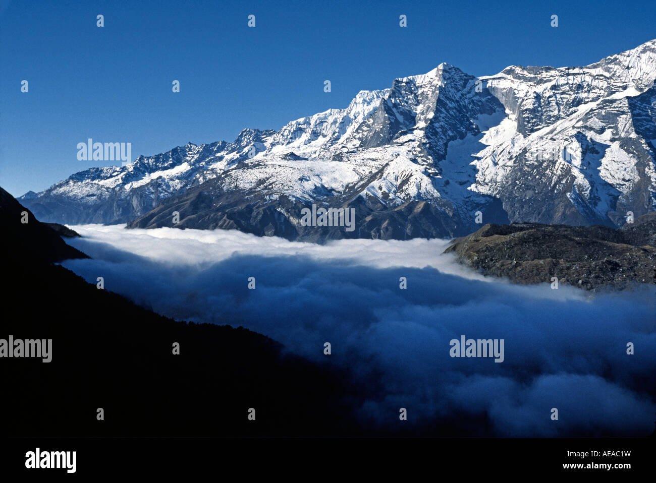 Low lying clouds Khumbila Peak 5761 Meters KHUMBU DISTRICT NEPAL Stock ...