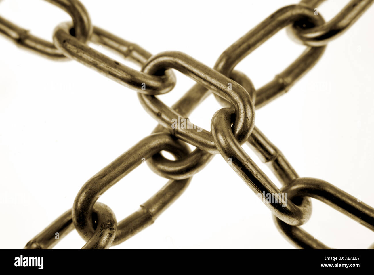 Chain links crisscrossing Stock Photo - Alamy