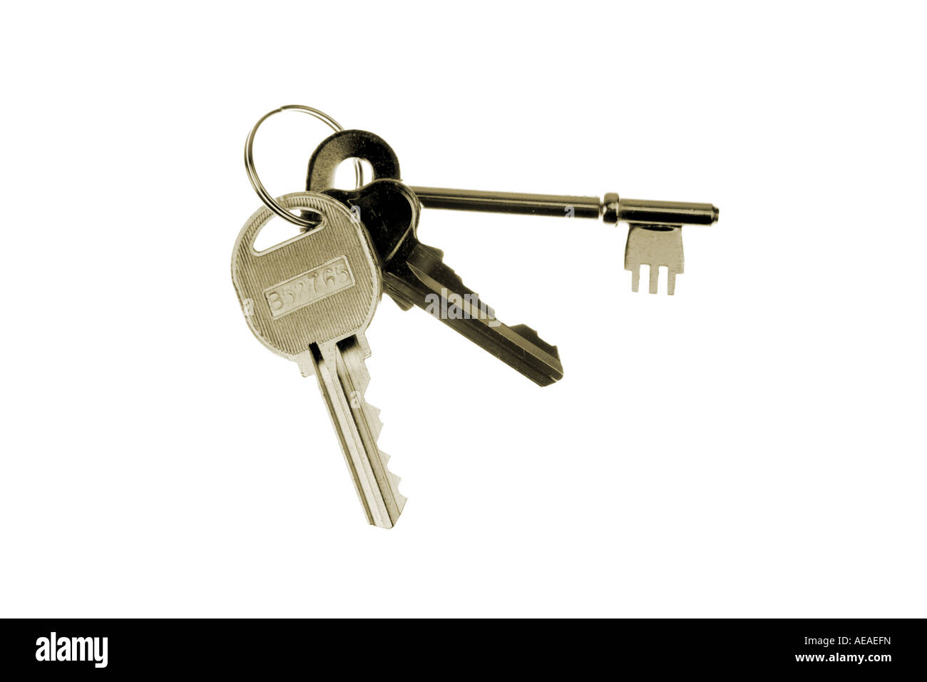 Three keys on keyring isolated Stock Photo - Alamy