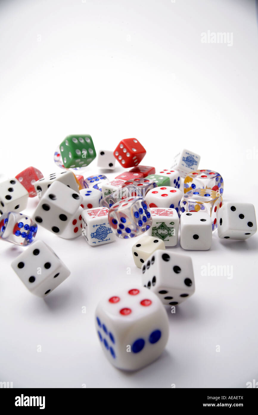 Tumbling dice on white background Stock Photo - Alamy