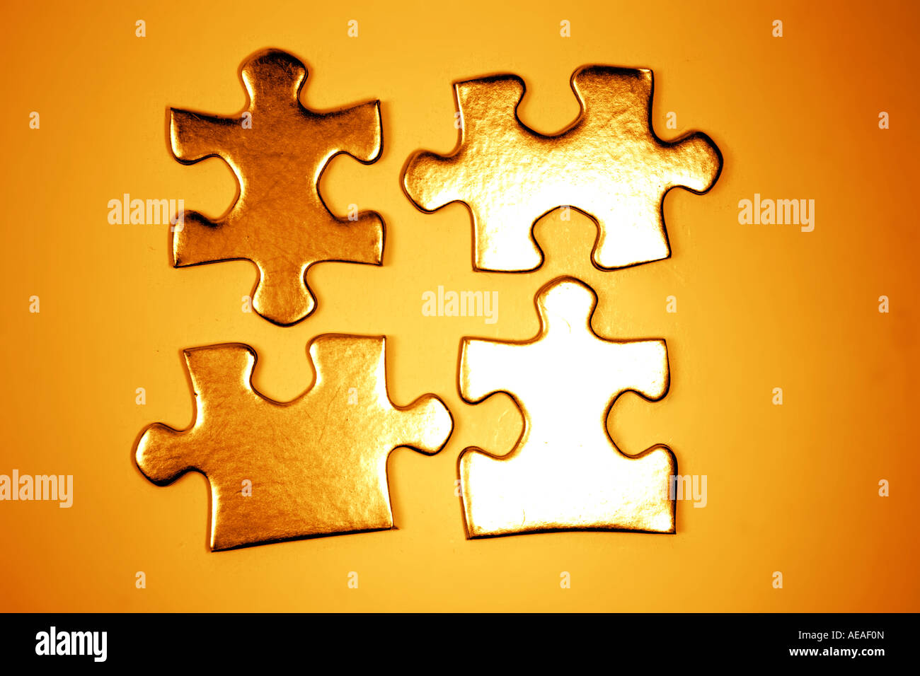 Four puzzle pieces Stock Photo - Alamy