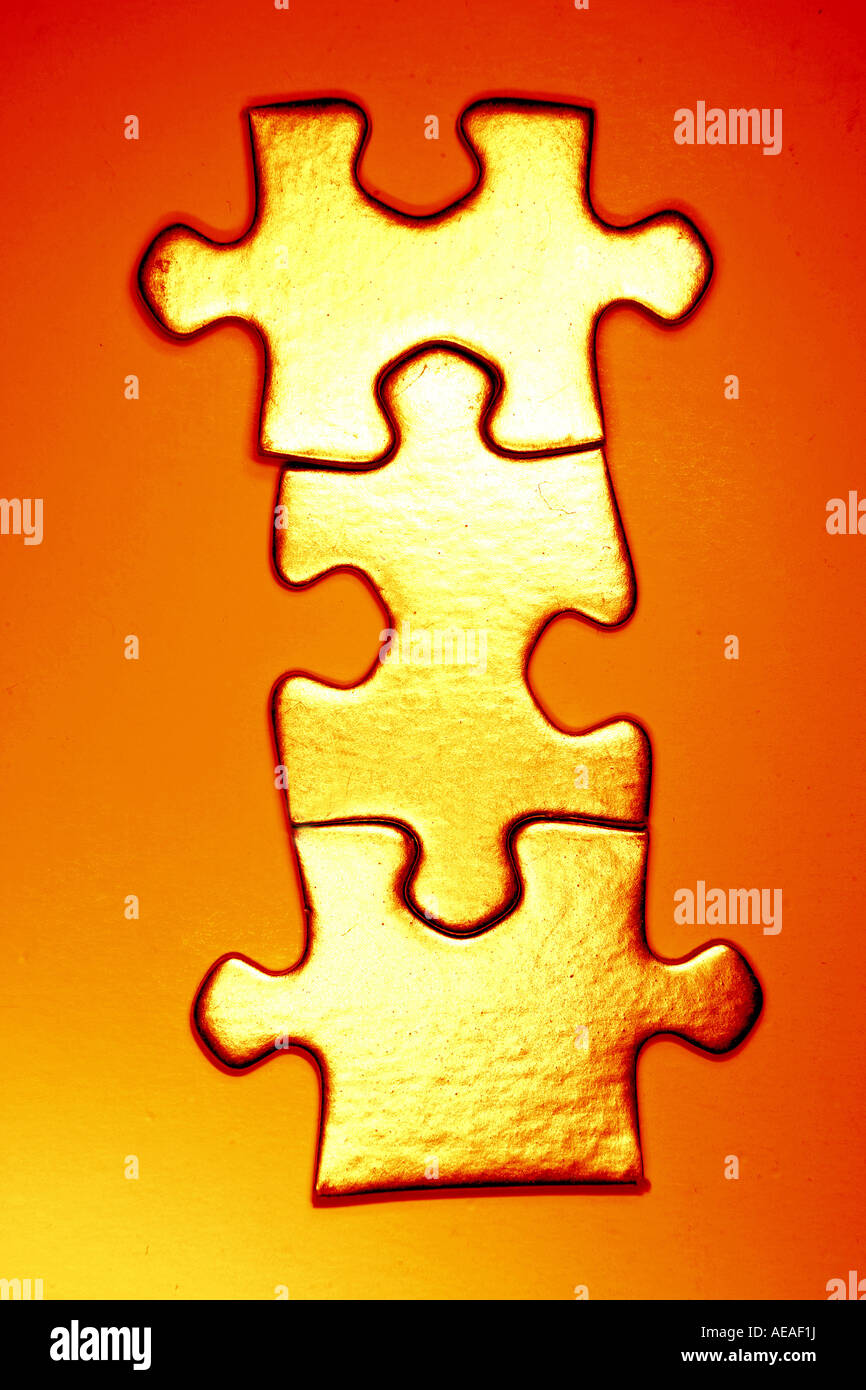 Three puzzle pieces connected Stock Photo - Alamy