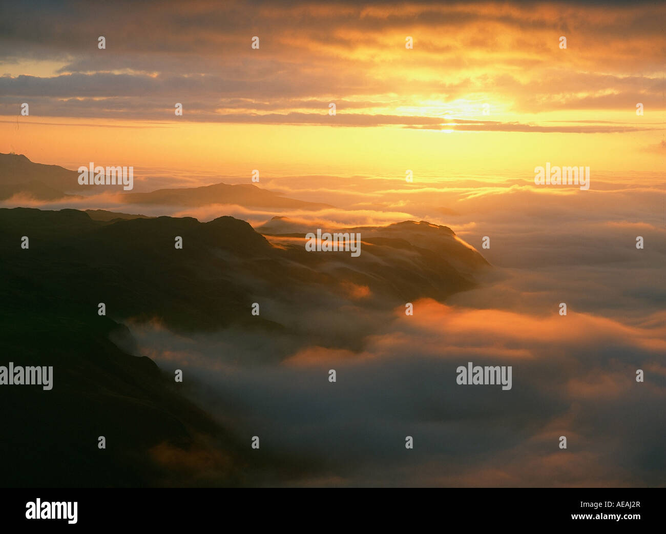 Mist over the sea at sunset hi-res stock photography and images - Alamy