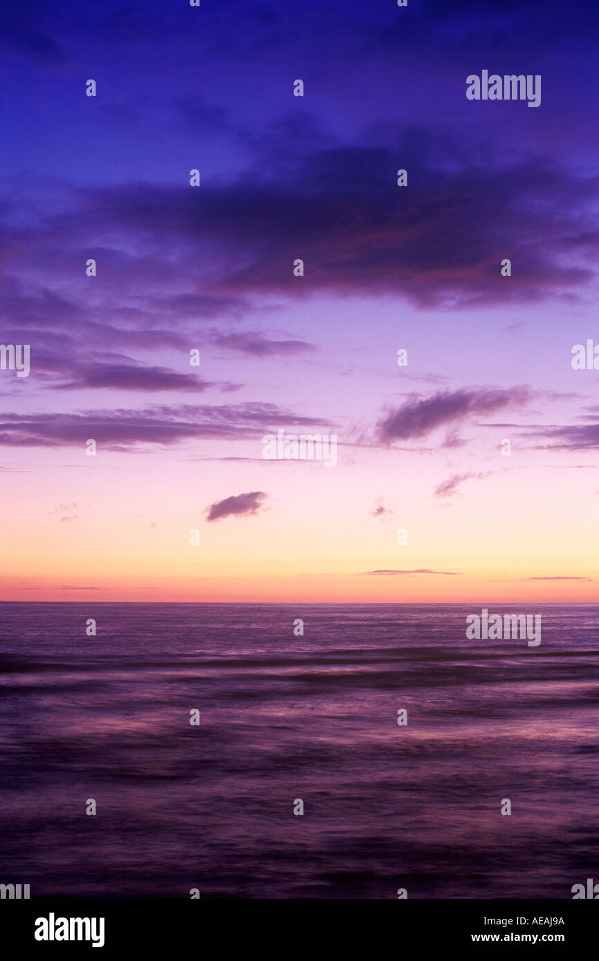 moody sunset over sea Stock Photo - Alamy