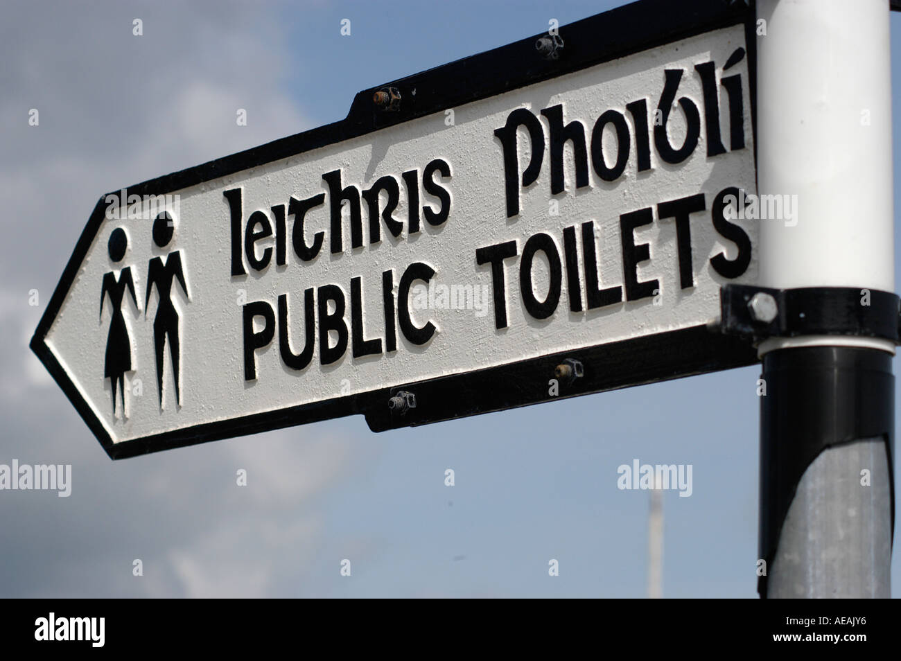 public toilets sign in english and irish Schull, Ireland Stock Photo ...