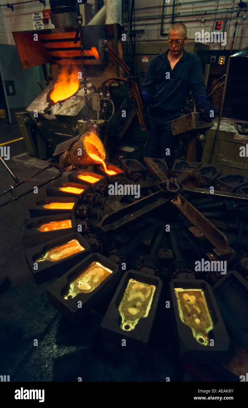 Pouring 99.3% pure gold into anode molds Australian Gold Refineries ...