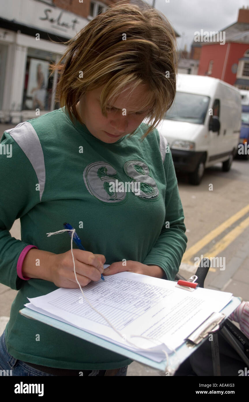 Woman collecting signatures hi-res stock photography and images - Alamy