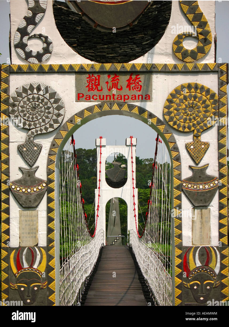 Suspension Bridge with Tribal Decorations Stock Photo - Alamy
