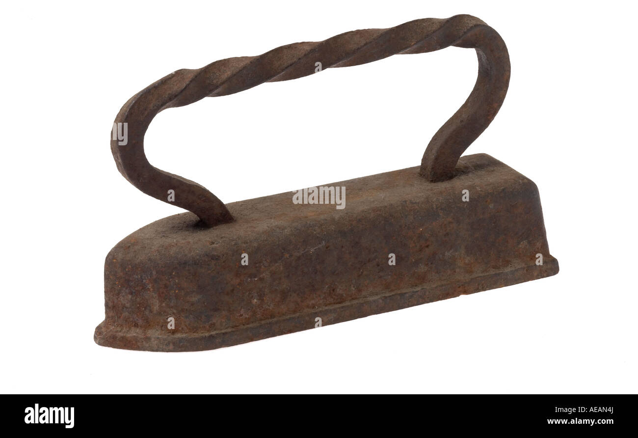 Antique Eatly Sad Iron Stock Photo - Alamy