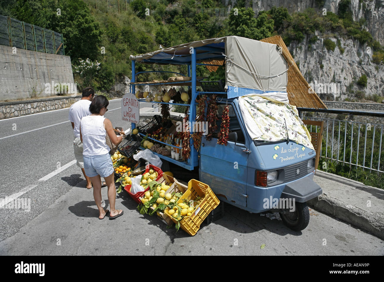 Street vendors with local produce on the road to Positano in Costiera ...