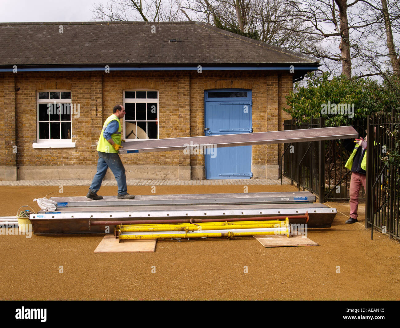 Men at work lifting Stock Photo - Alamy