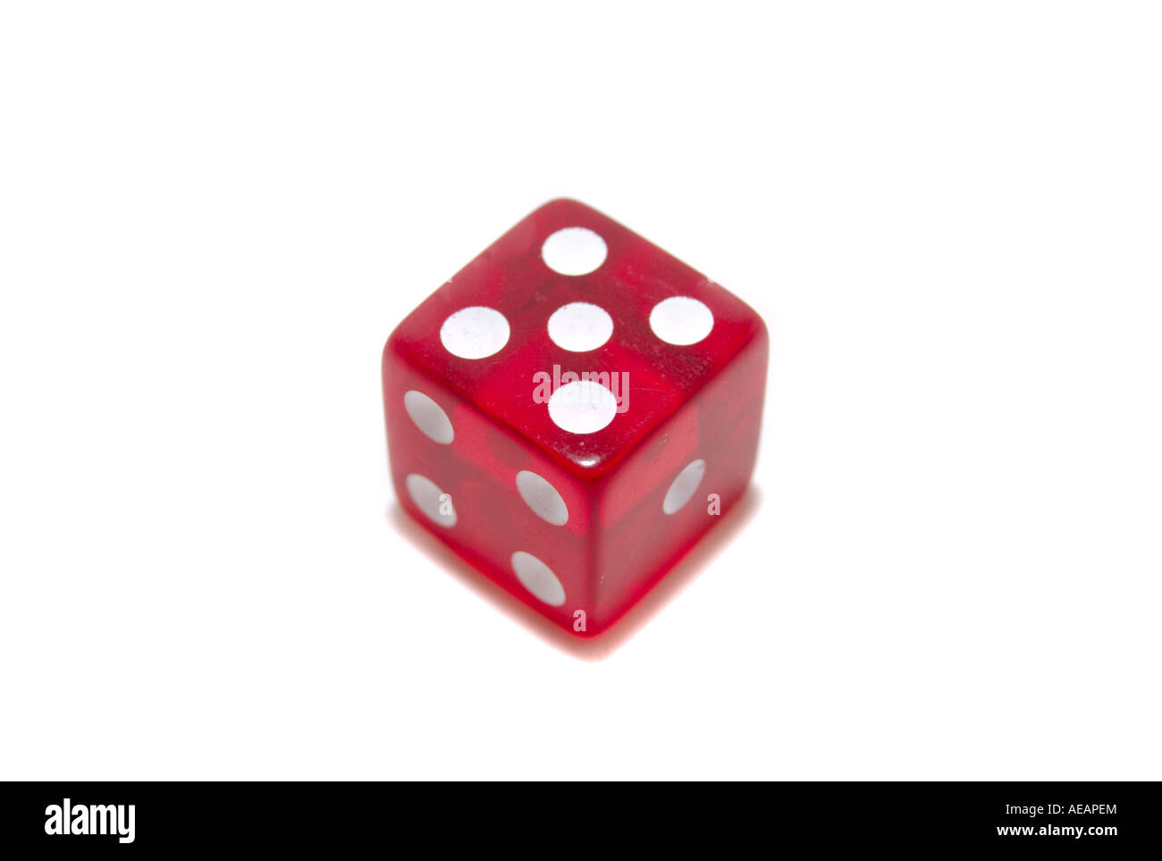 A red casino dice on white isolated background showing the number Five ...