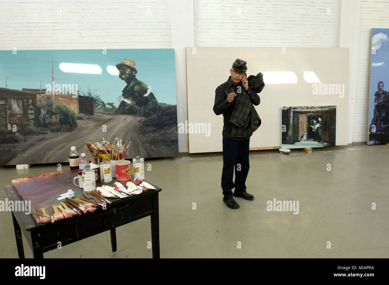 Yang Shaobin, chinese contemporary artist, poses in his studio in ...