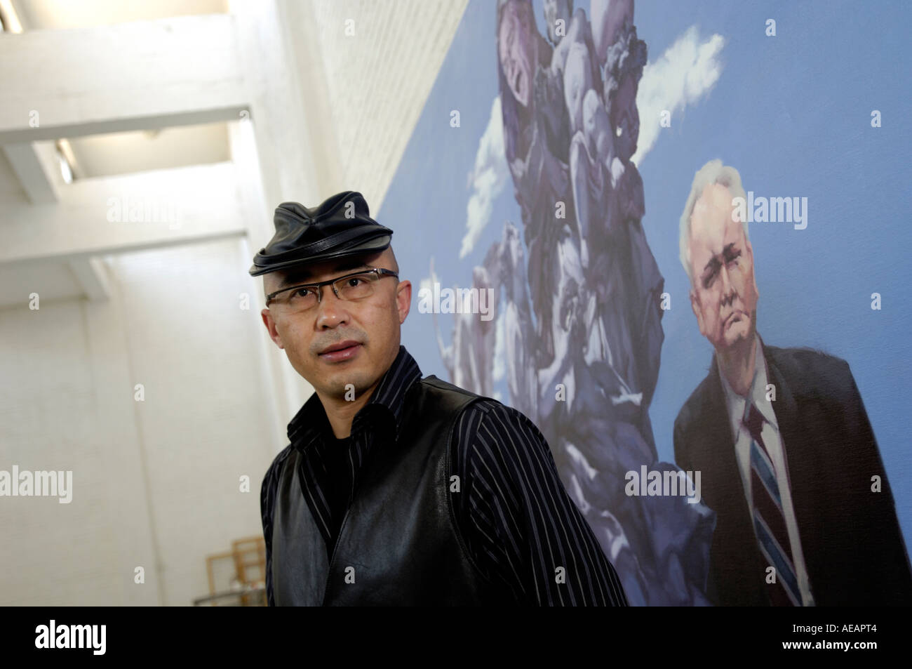 Yang Shaobin, chinese contemporary artist, poses in front of his work ...