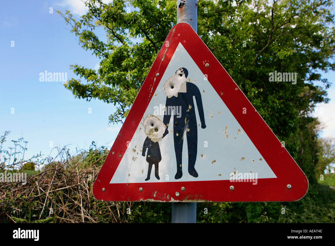 Road sign used for target practice and shot with airgun pellets North ...