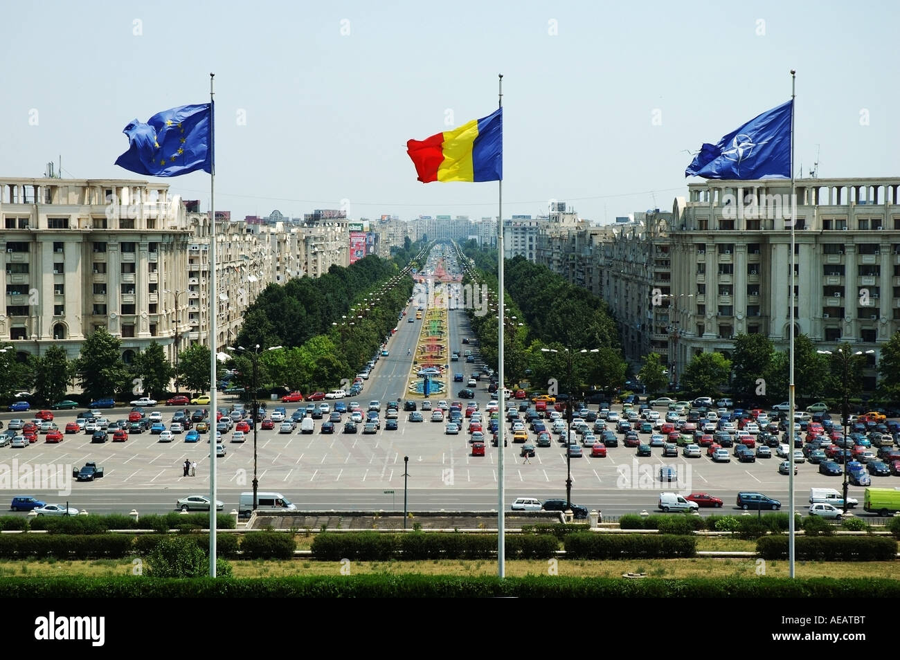 Constitution Square, tree and fountain lined Union Avenue, Bucharest ...