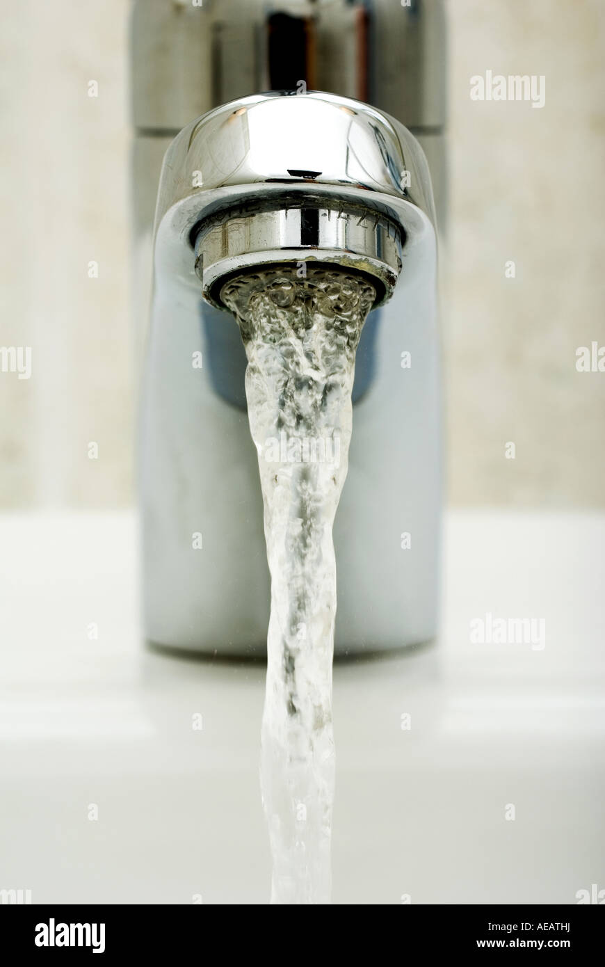 close-up running water out of a tap Stock Photo - Alamy
