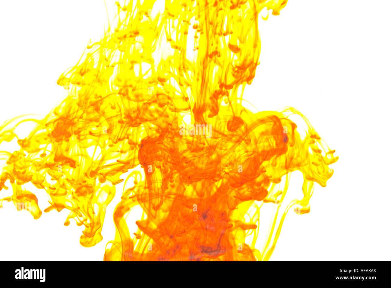 Coloured ink in water creating graphic swirling patterns Stock Photo ...