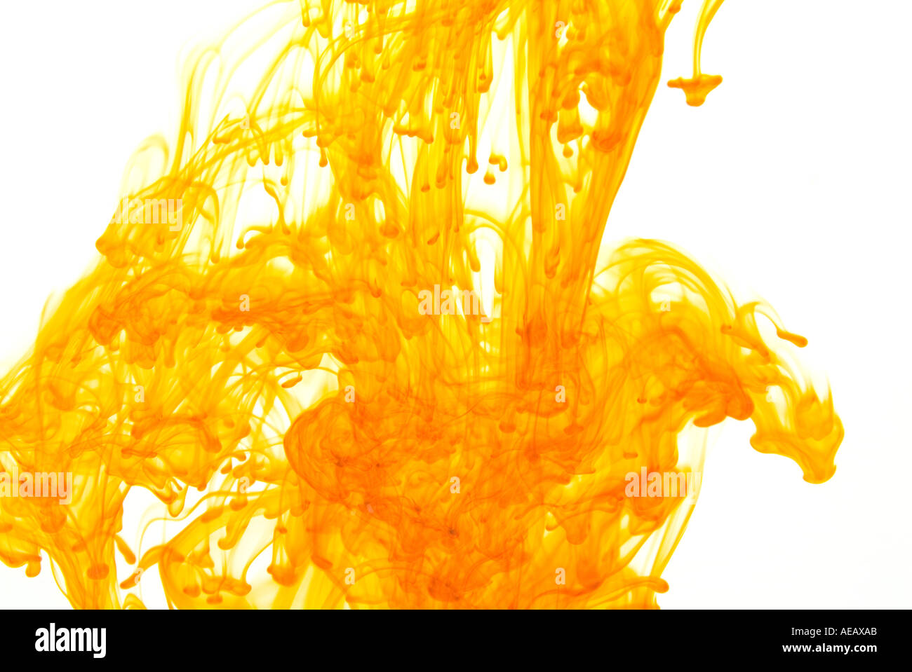 Coloured ink in water creating graphic swirling patterns Stock Photo ...