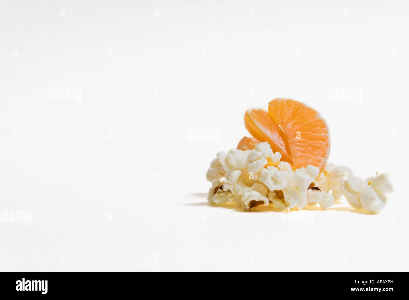 Popcorn and Oranges Stock Photo - Alamy
