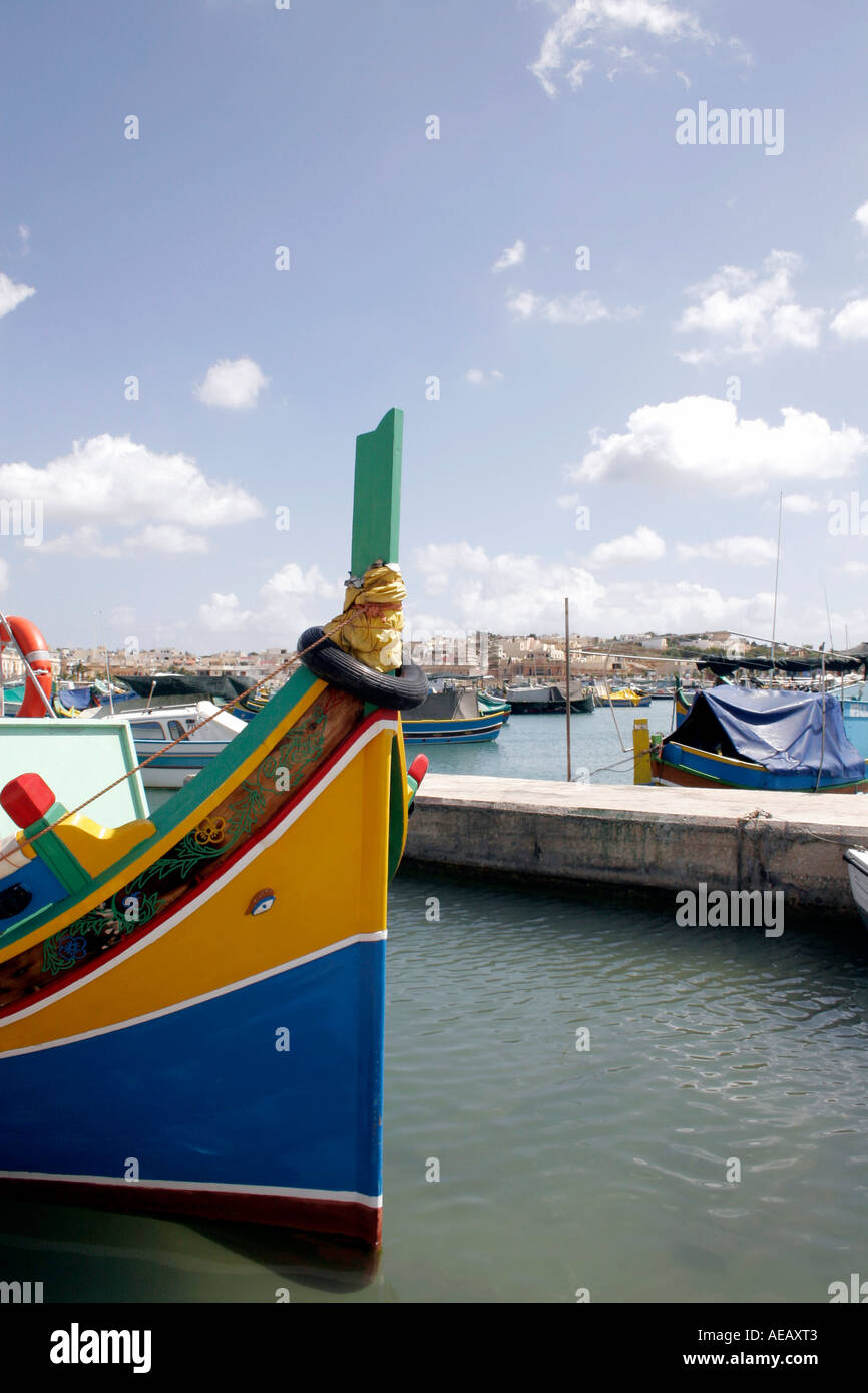 TRADITIONAL LUZZU FISHING BOAT MOORED IN MARSAXLOKK HARBOUR. MALTA ...