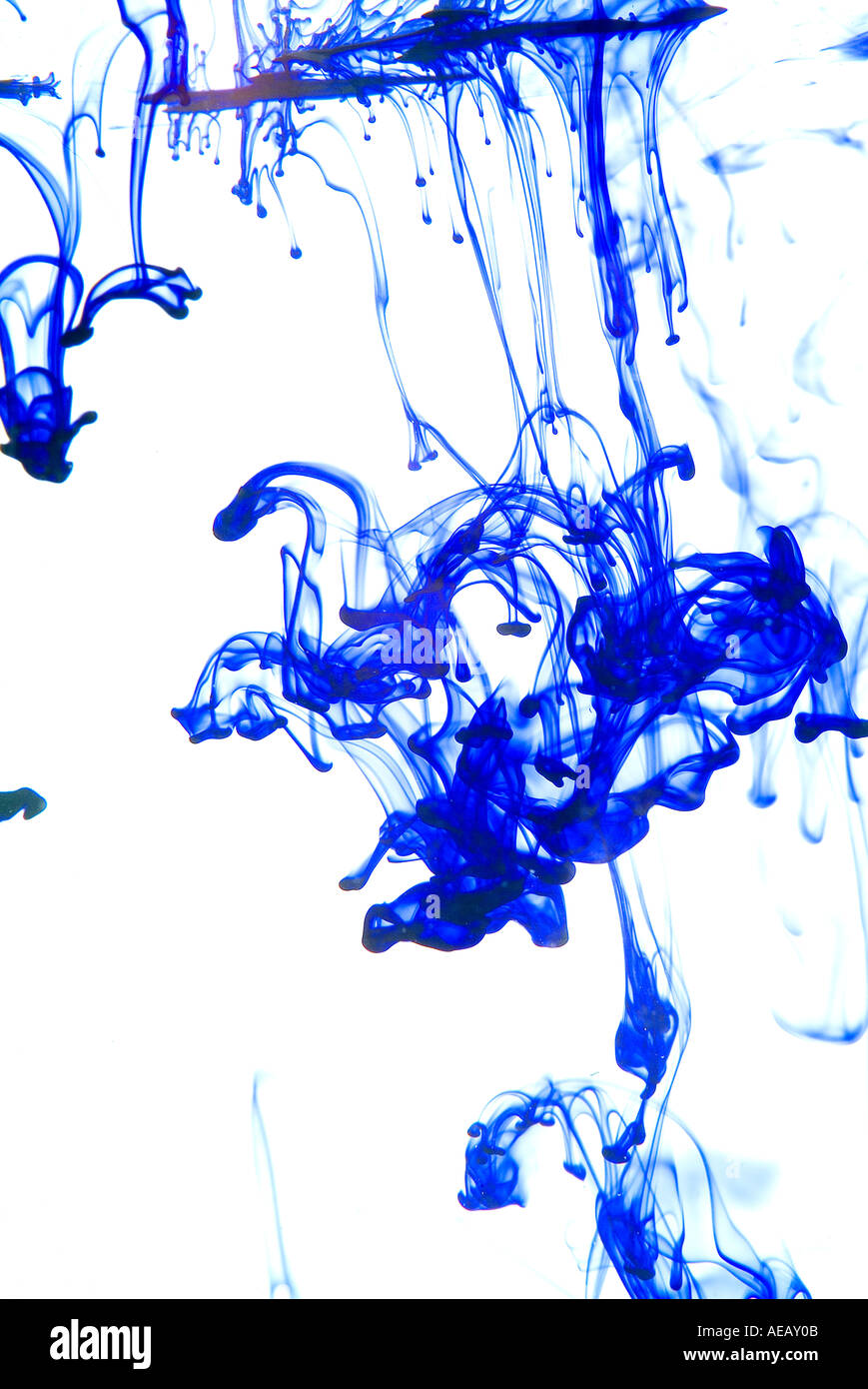 Coloured ink in water creating graphic swirling patterns Stock Photo ...
